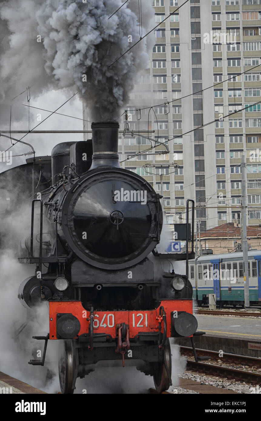 Steam locomotive leaving the station Stock Photo - Alamy