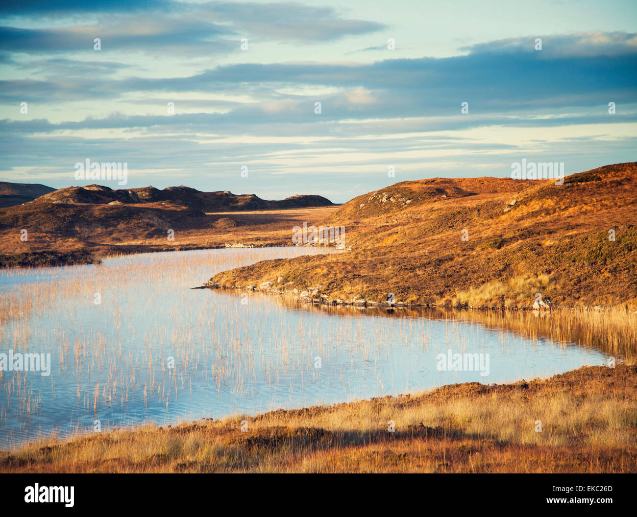 View of loch and distant mountains, Assynt, North West Highlands ...