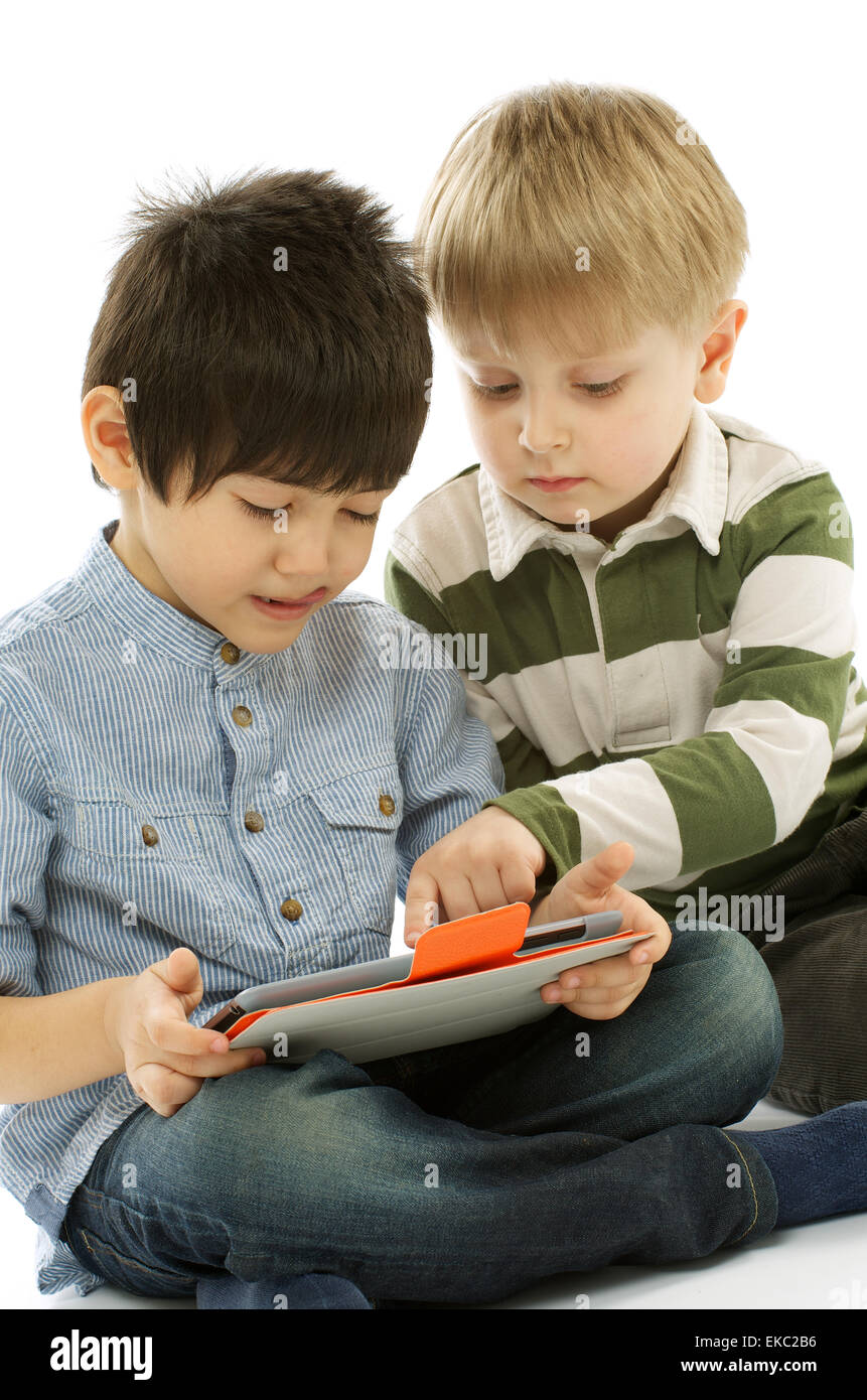 Two Boys with Digital Tablet PC Stock Photo - Alamy