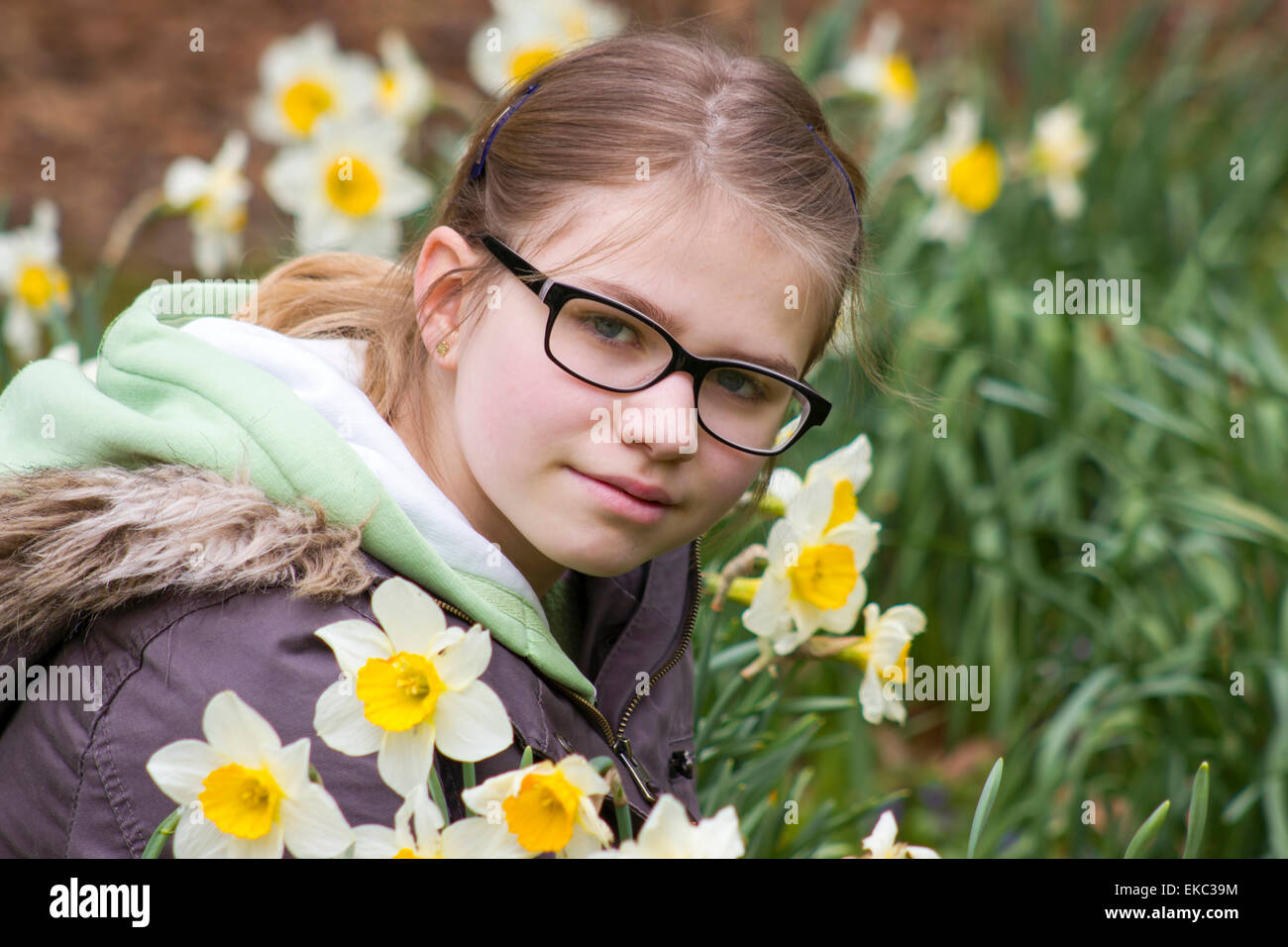 young girl in spring park Stock Photo - Alamy
