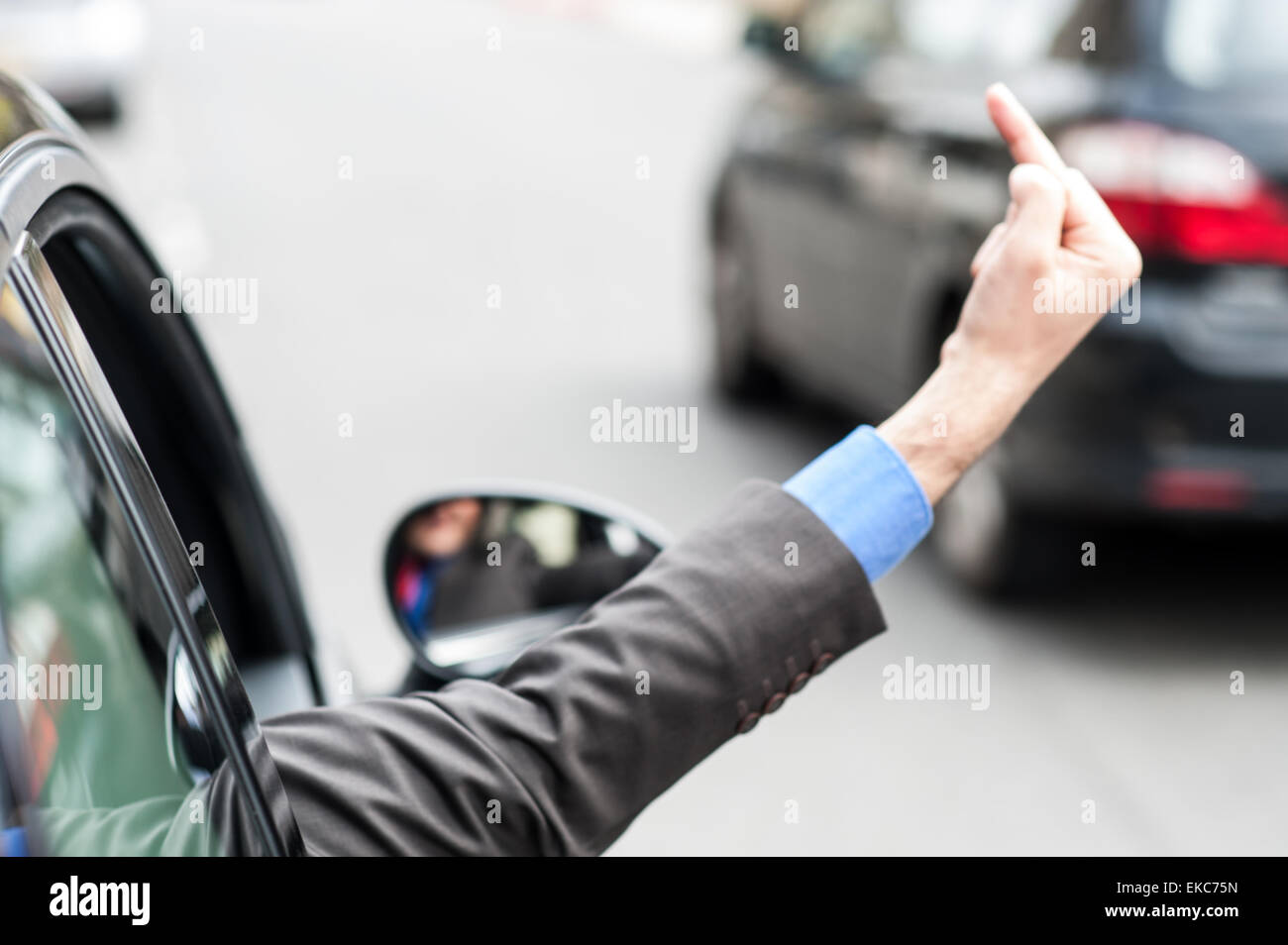 Man showing middle finger from car window Stock Photo - Alamy