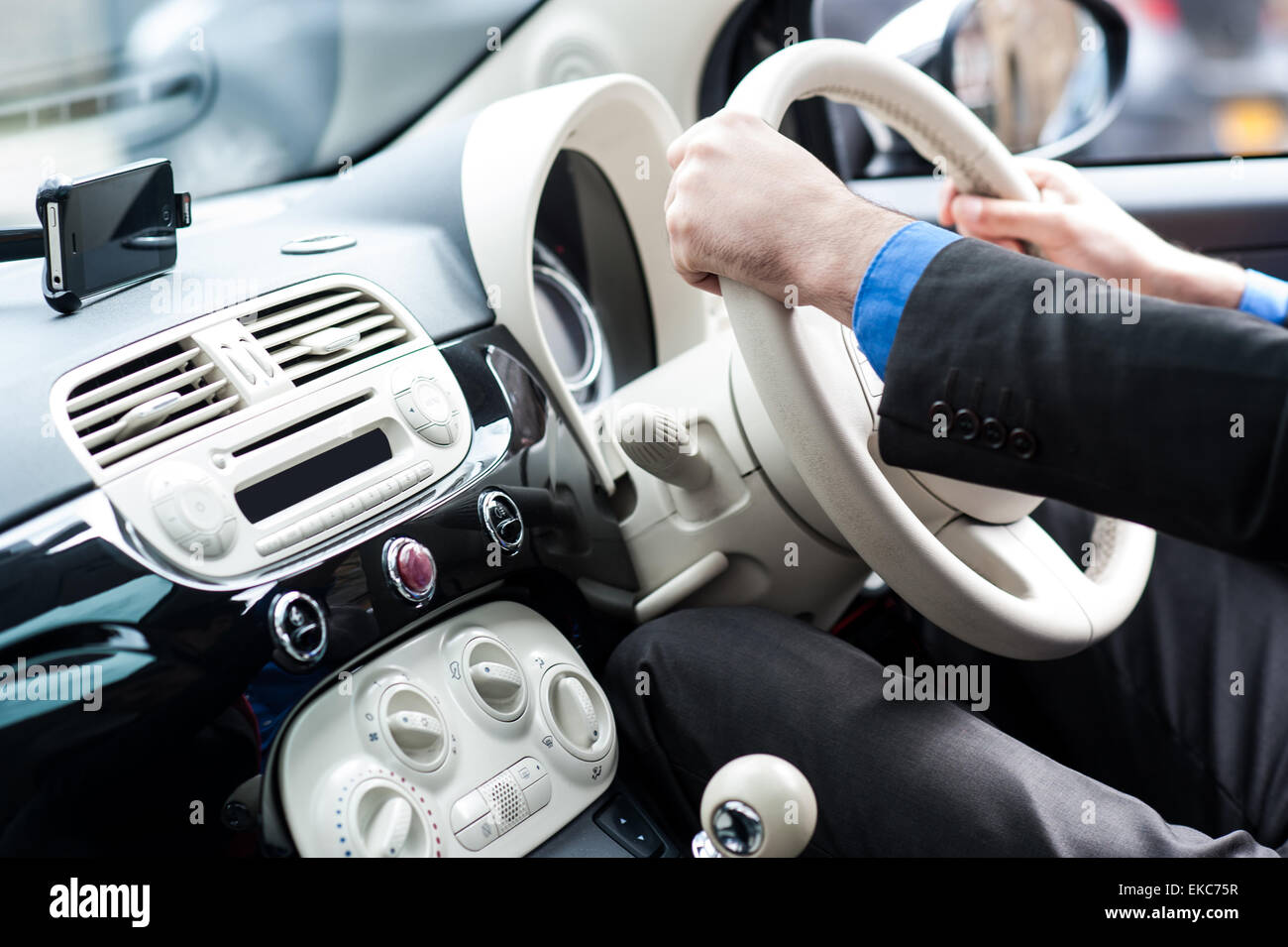 Man driving car holding steering hi-res stock photography and images ...