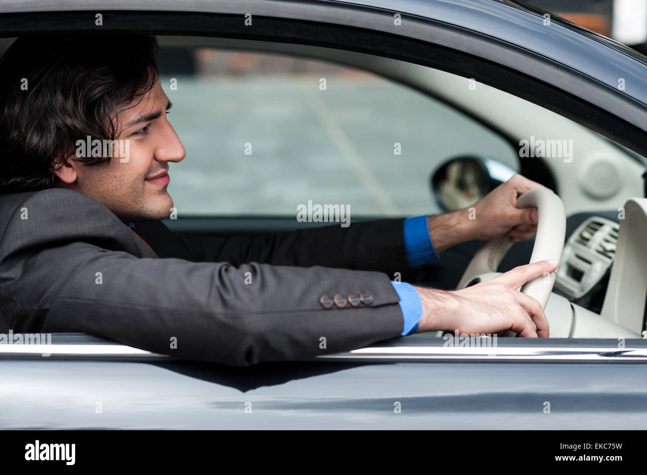 Man driving his car Stock Photo - Alamy