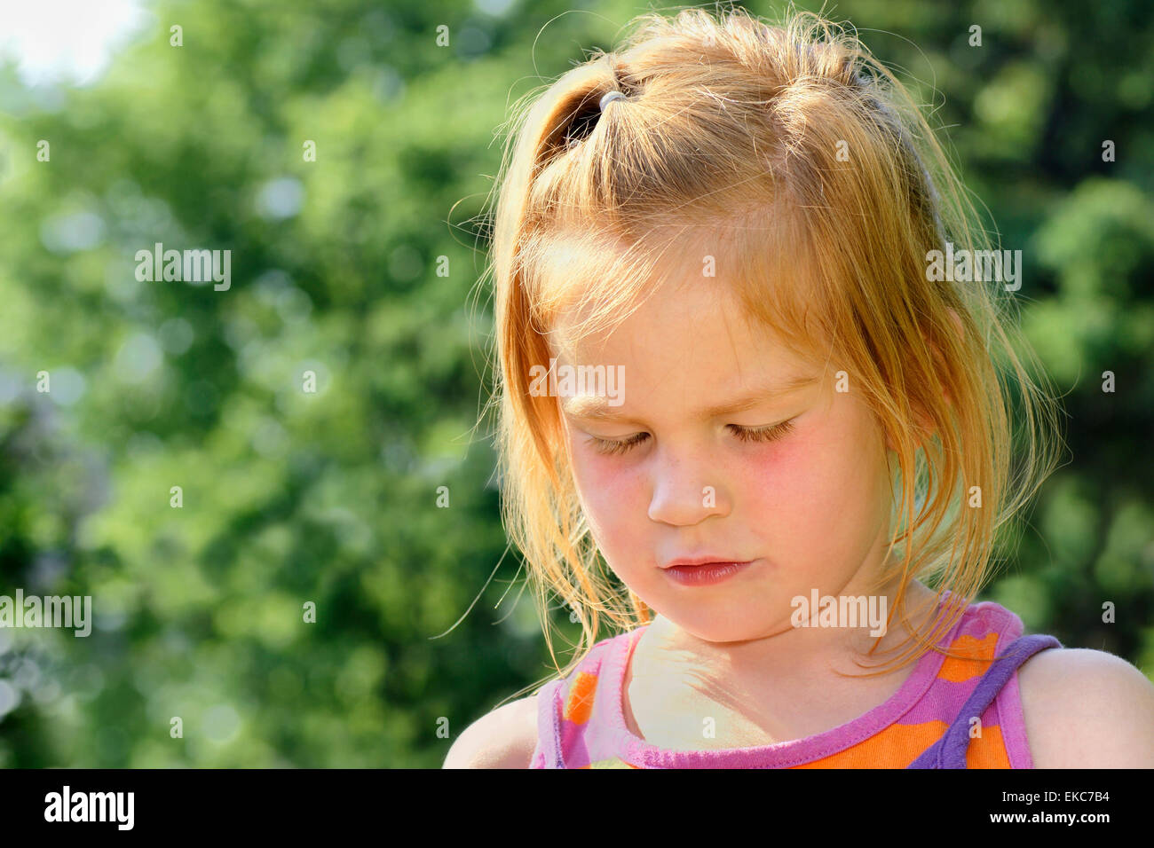 Crying red hair little girl Stock Photo - Alamy