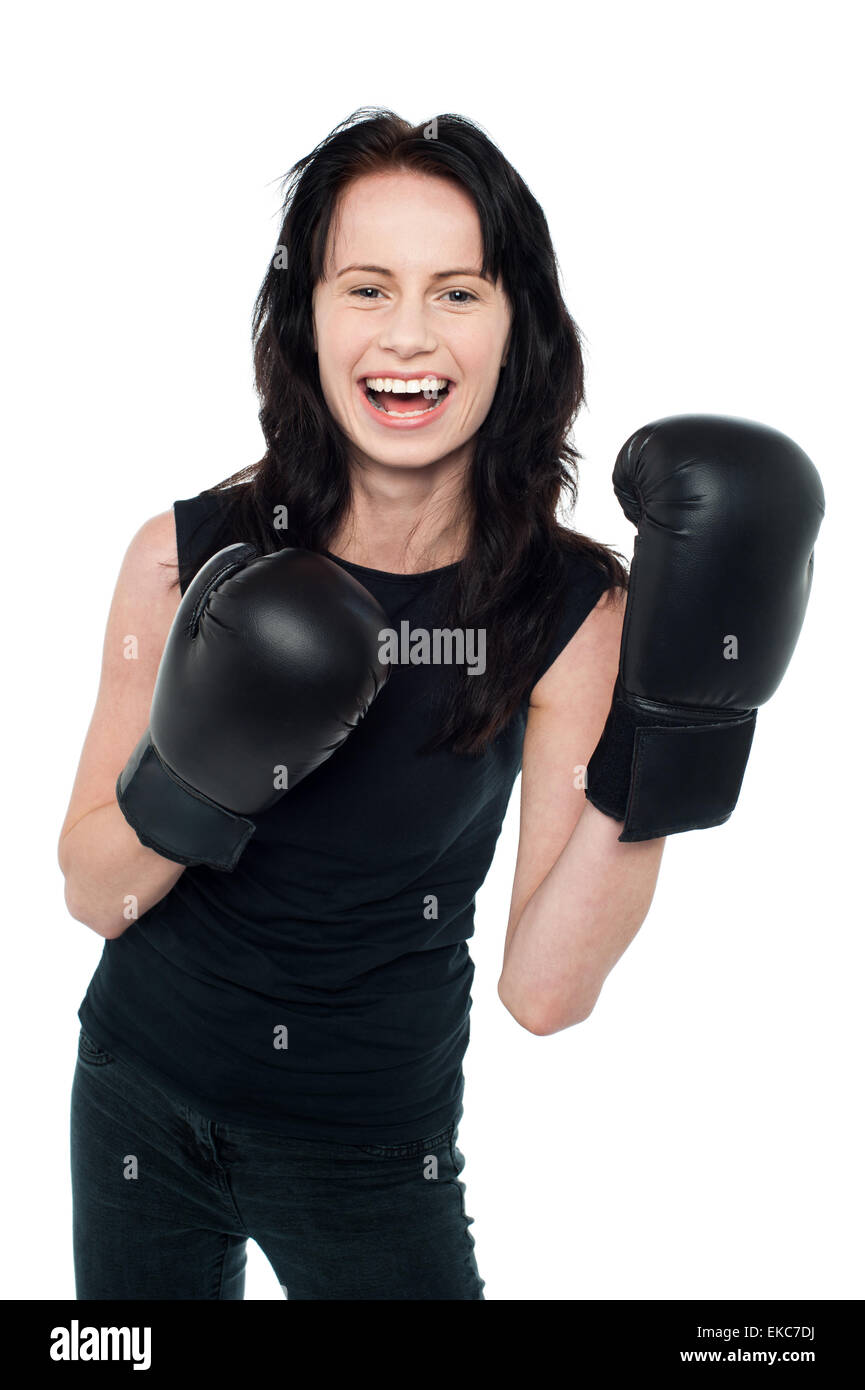 Smiling young slim female boxer Stock Photo - Alamy