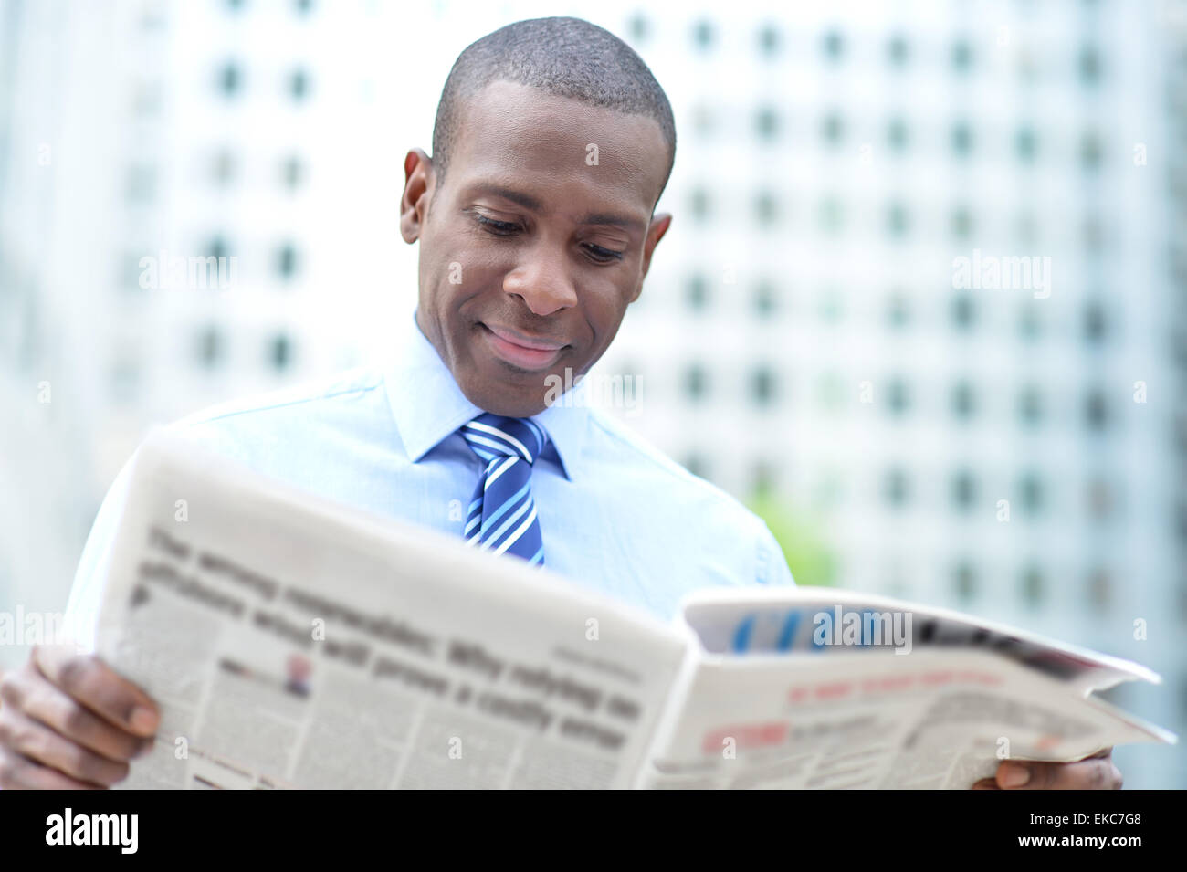 Handsome positive man outdoors hi-res stock photography and images - Alamy