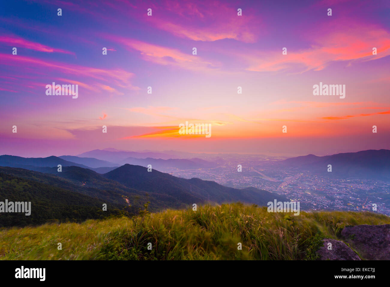 Sunset in the mountains Stock Photo - Alamy