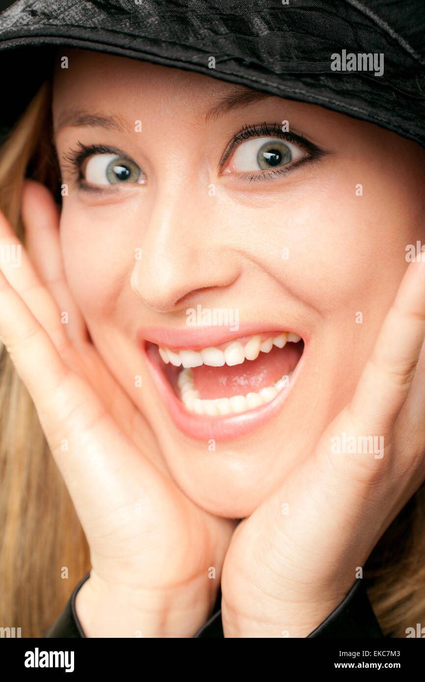 Surprised woman face scream Stock Photo - Alamy