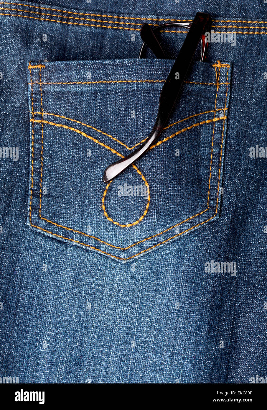 Eyeglasses in back pocket of jeans Stock Photo - Alamy