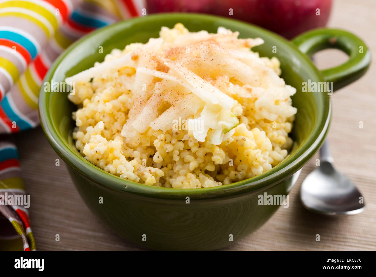 Portion of sweet millet porridge with apple and cinnamon Stock Photo - Alamy