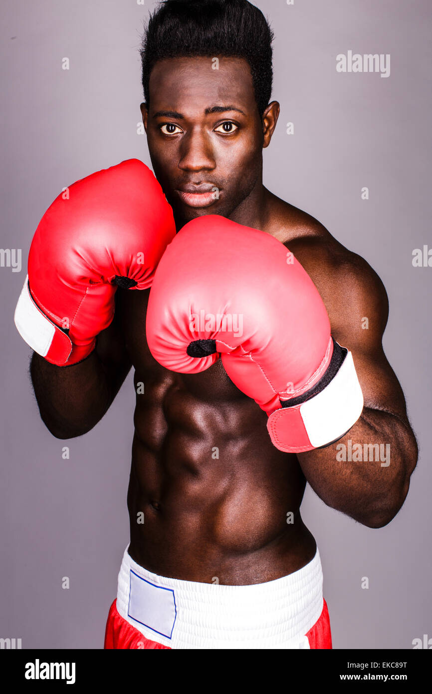 Muscular male boxer with serious look on face Stock Photo - Alamy