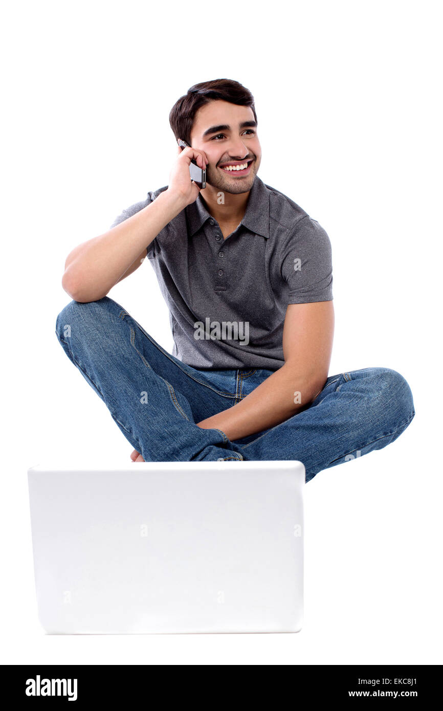 Smart guy communicating through cellphone Stock Photo - Alamy