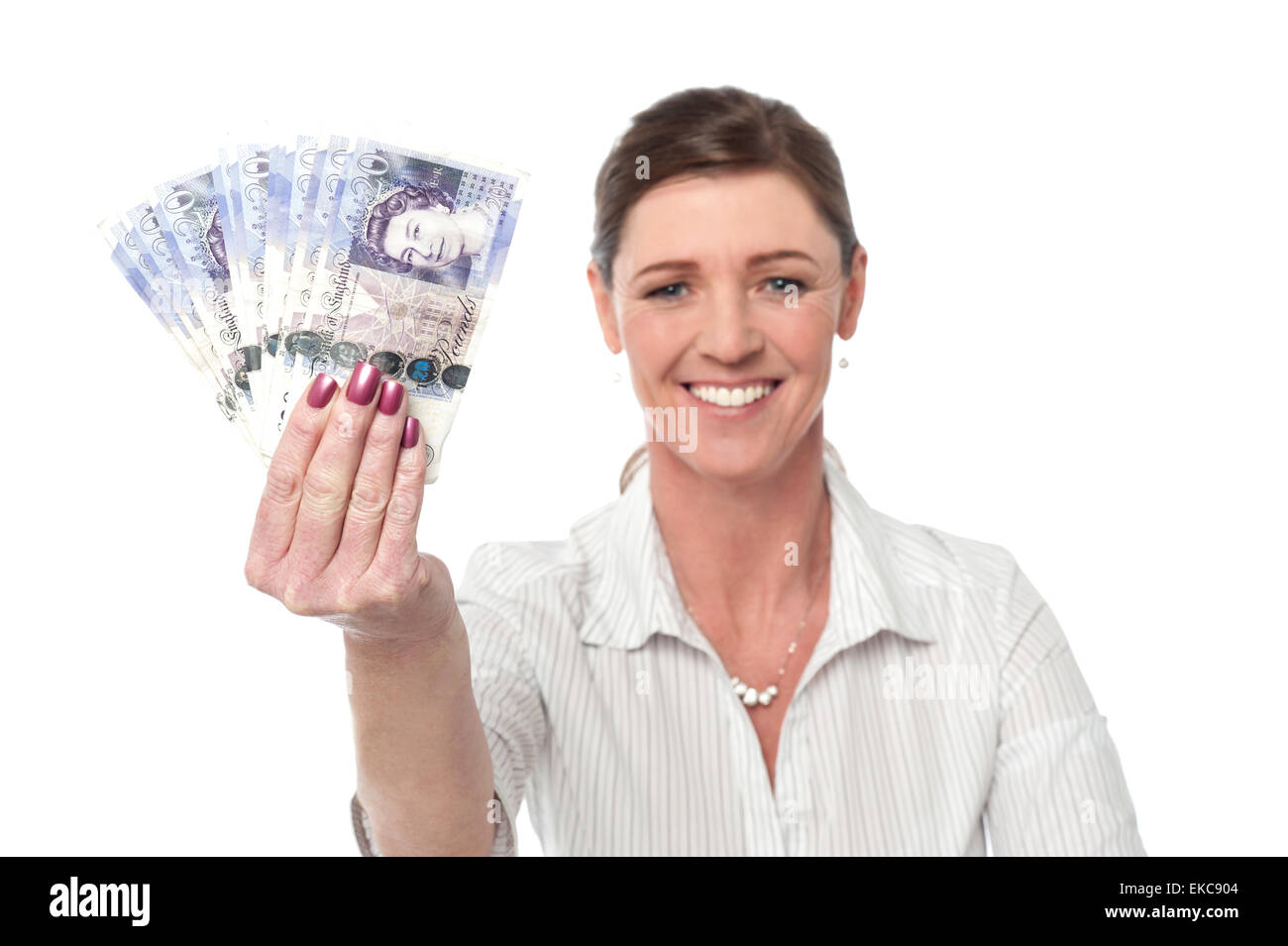 Business woman holding fan of currency notes Stock Photo - Alamy