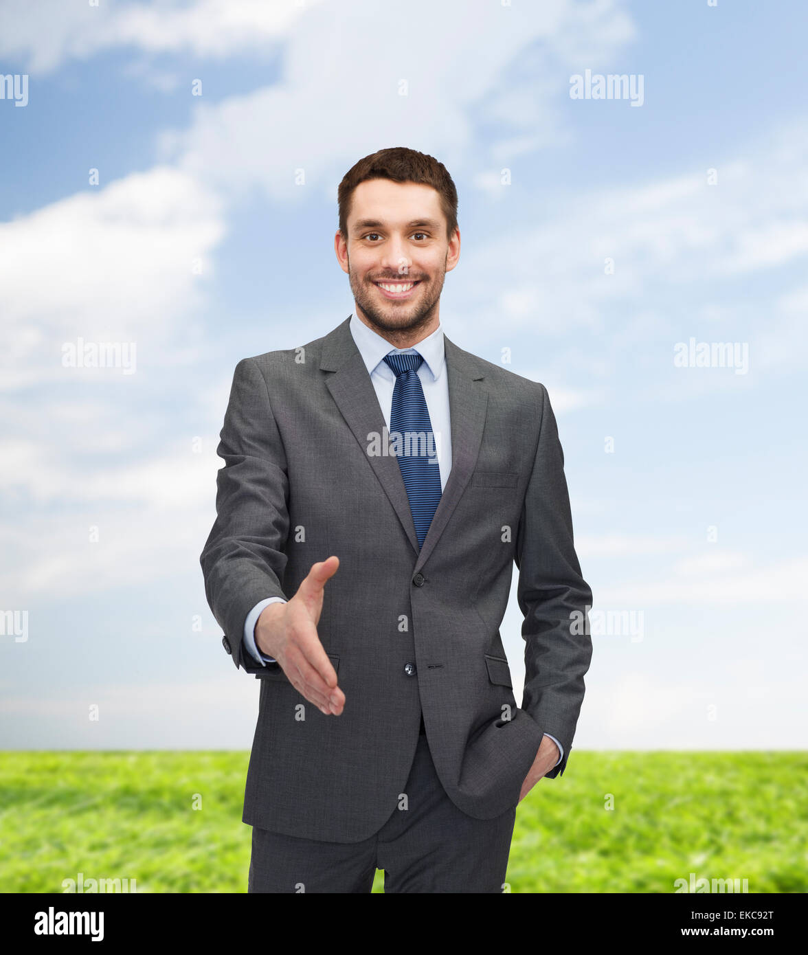 businessman with open hand ready for handshake Stock Photo - Alamy