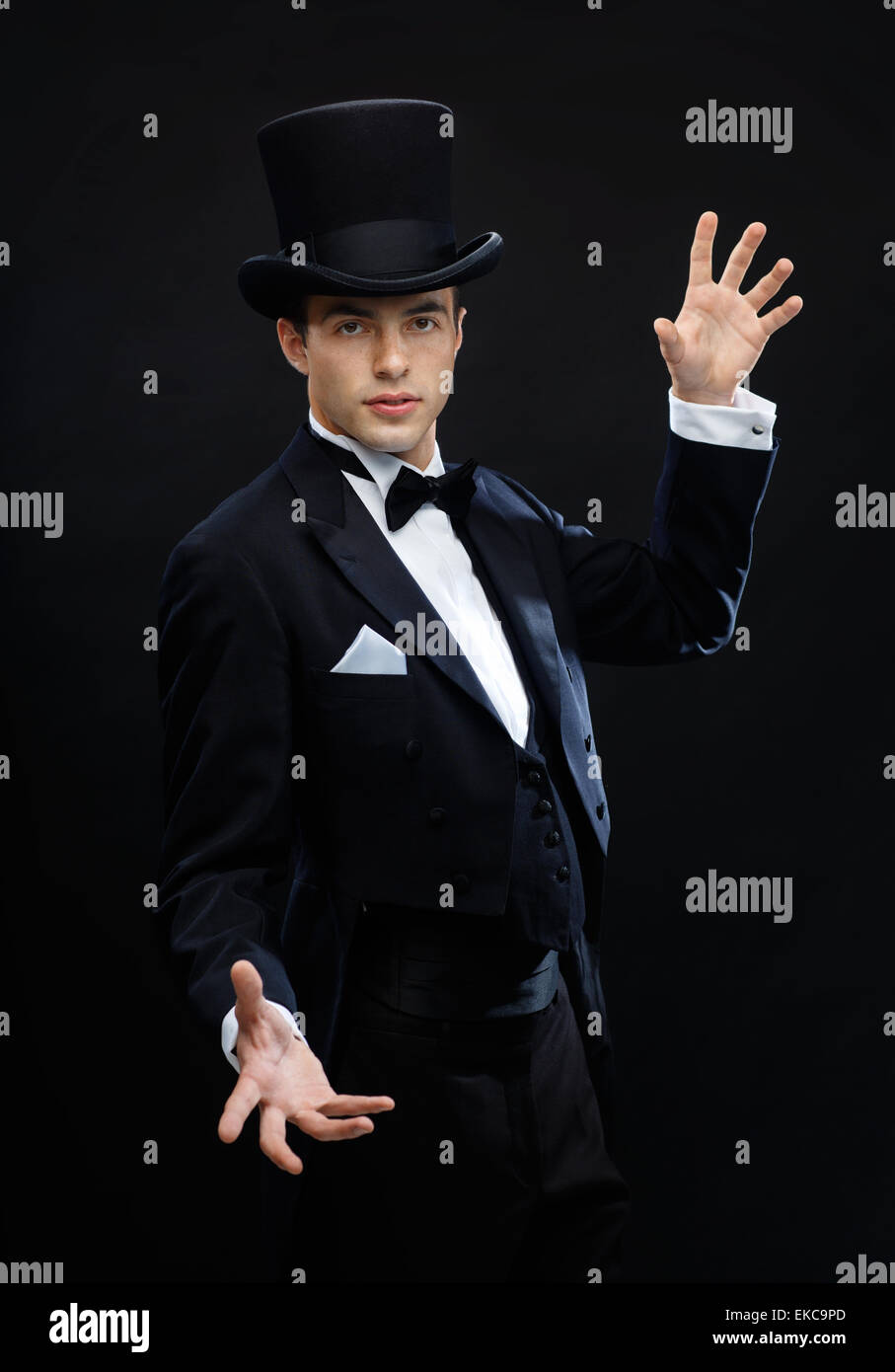 magician in top hat showing trick Stock Photo - Alamy