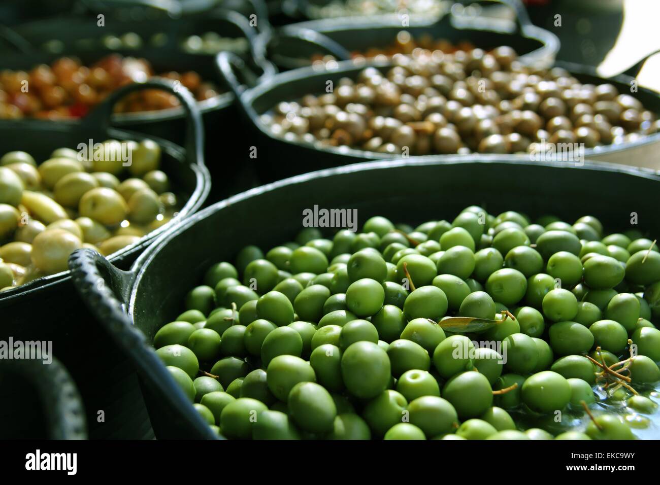 olives in pickling brine background texture Stock Photo - Alamy