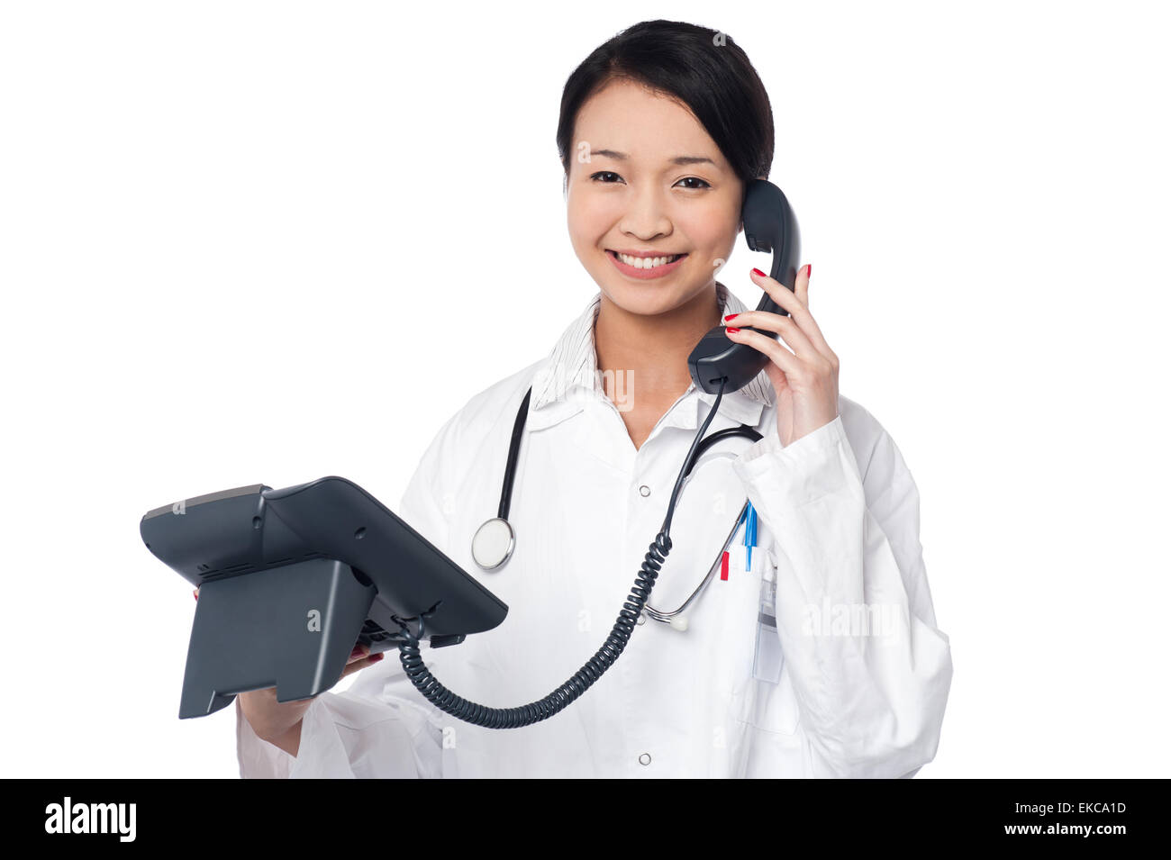 Young lady doctor answering phone call Stock Photo - Alamy