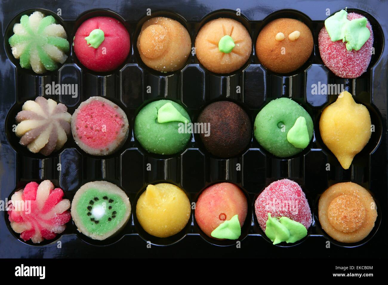 Colorful marzipan sweets with fruits shapes Stock Photo - Alamy