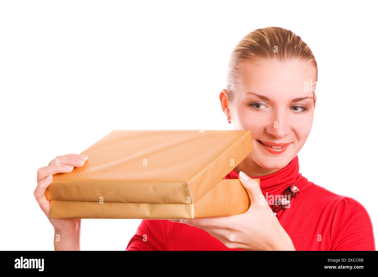 Blond girl with opening a box Stock Photo - Alamy