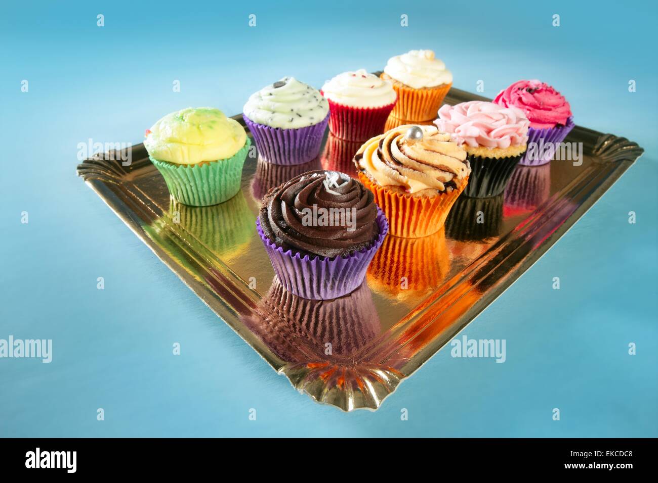 Cupcakes colorful cream muffin arrangement Stock Photo - Alamy