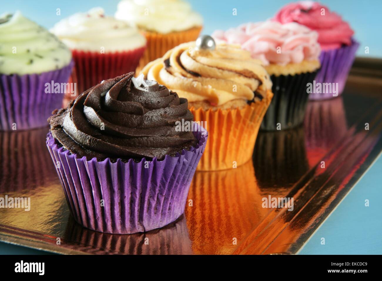 Cupcakes colorful cream muffin arrangement Stock Photo - Alamy