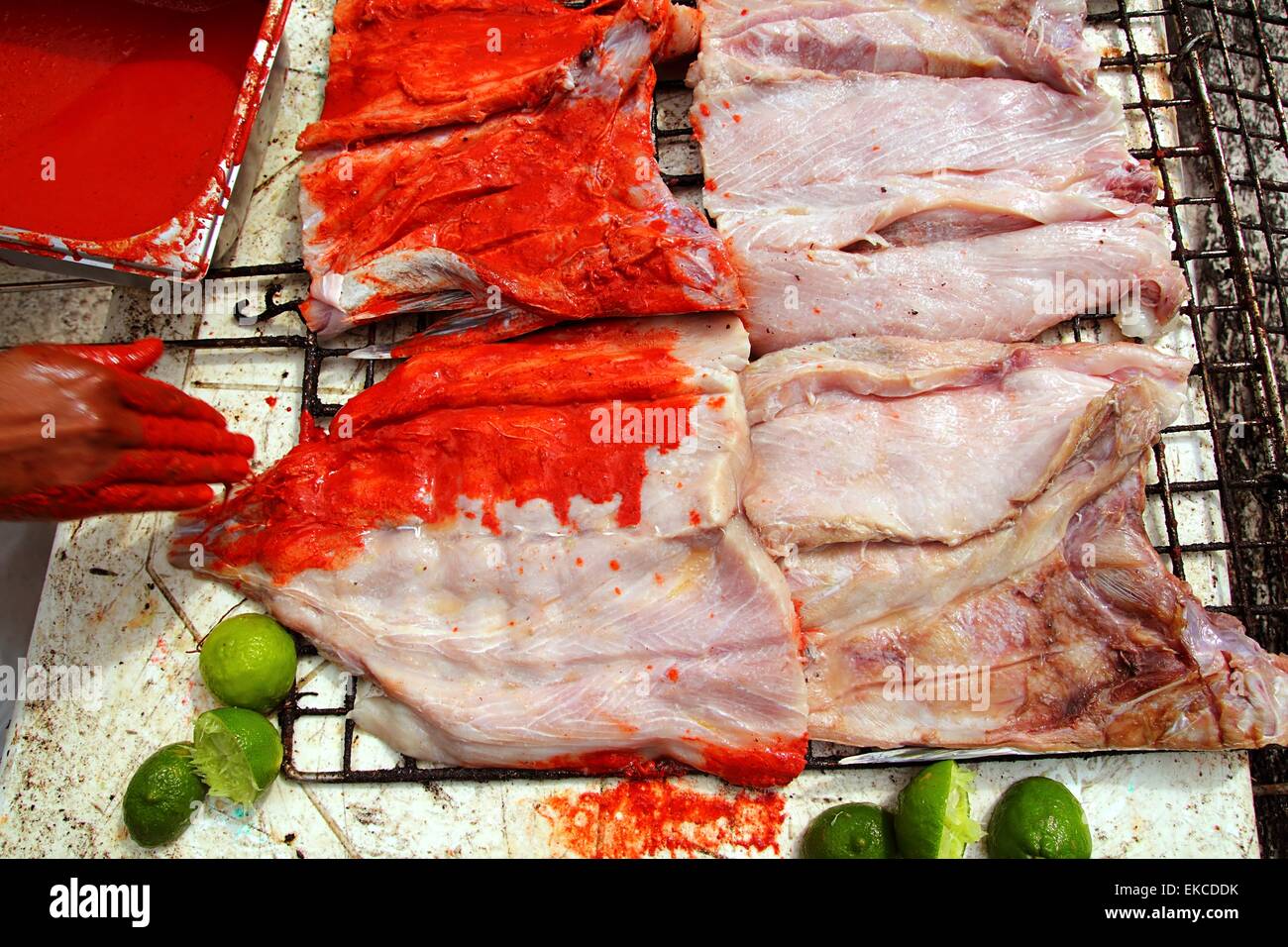 grilled fish fillet red achiote sauce tikinchik Stock Photo - Alamy