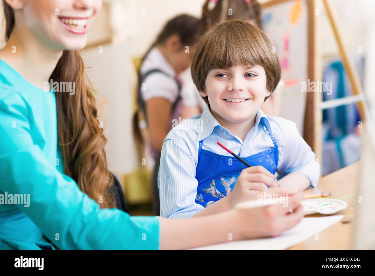 teacher and student in the classroom Stock Photo - Alamy