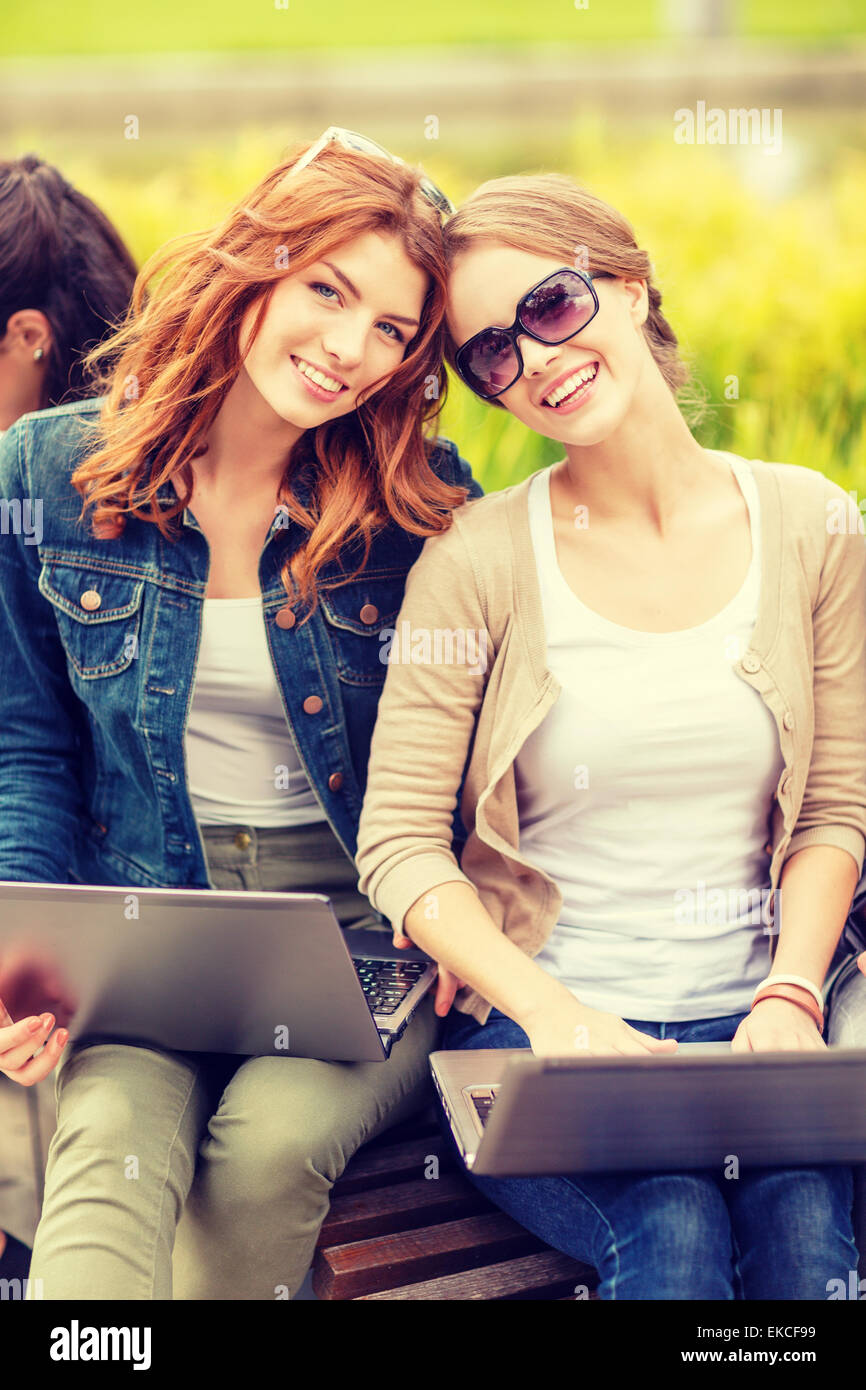two female students with laptop computers Stock Photo - Alamy