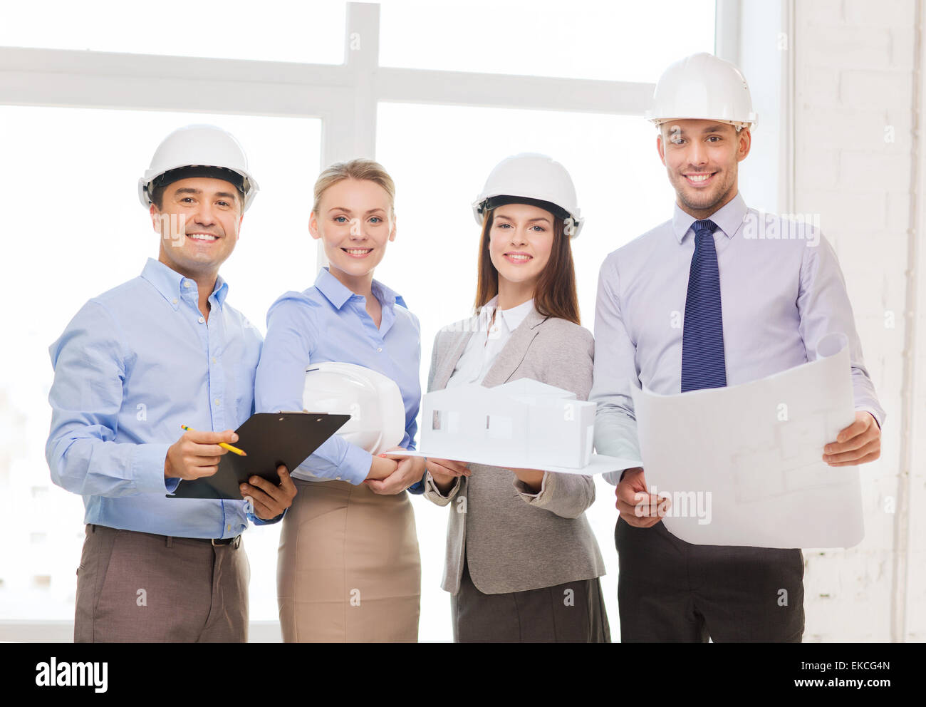 happy business team in office Stock Photo - Alamy