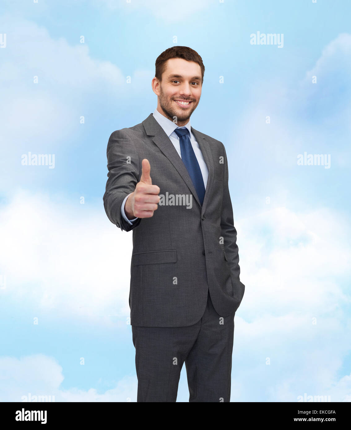 handsome buisnessman showing thumbs up Stock Photo - Alamy