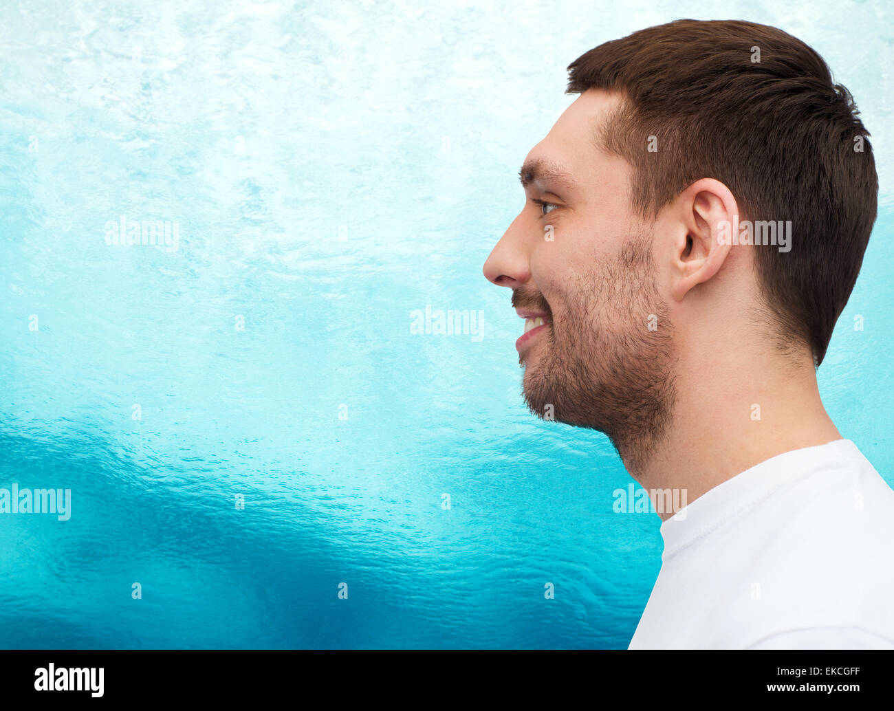 Handsome smiling man face profile hi-res stock photography and images ...