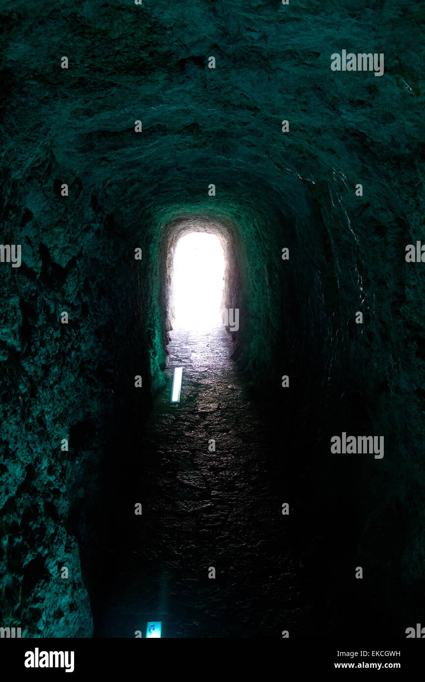 Cave tunnel arch shape like narrow dark corridor Stock Photo - Alamy