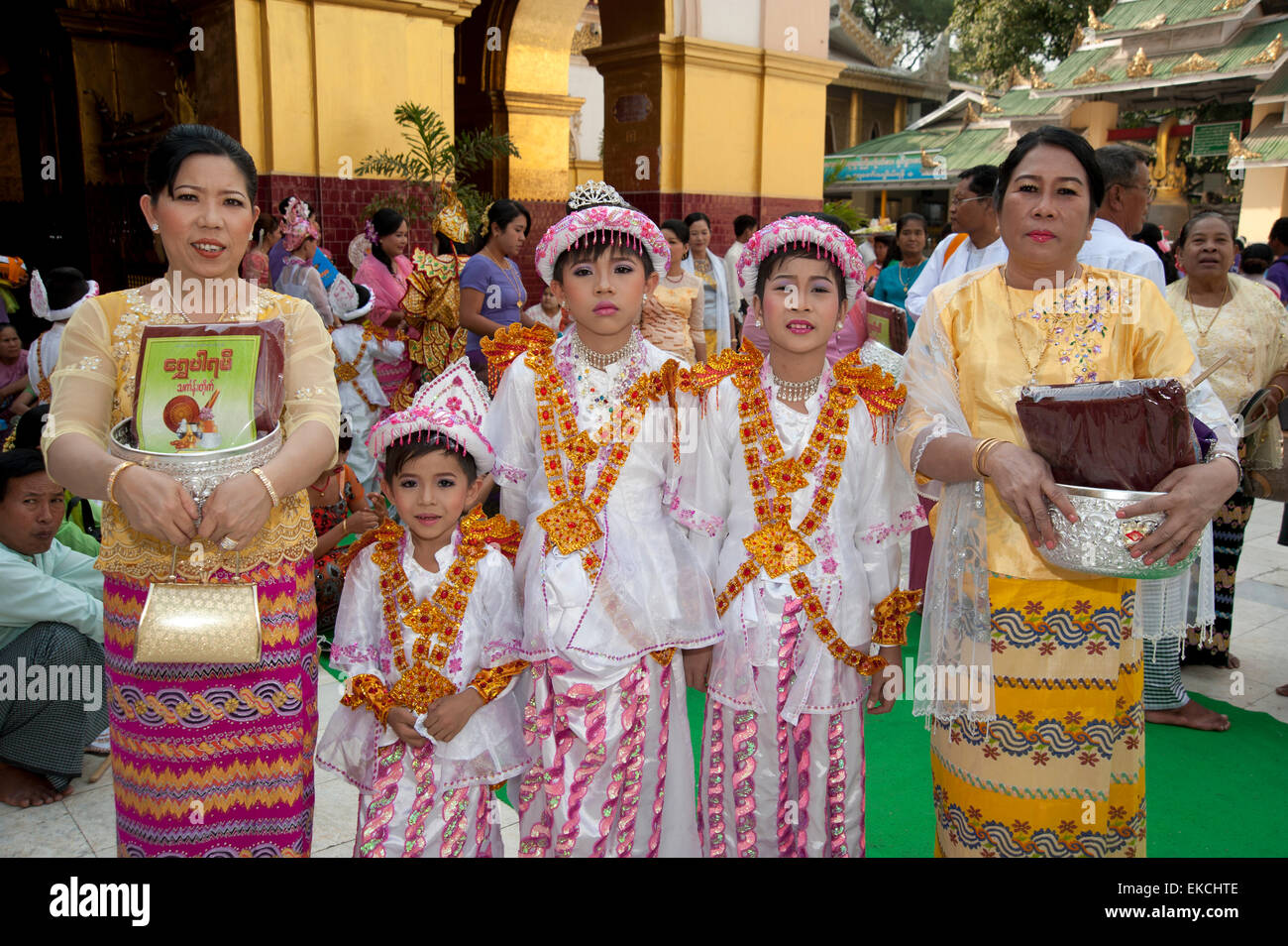 Children and their families parade in gaudy bejeweled costumes in their ...