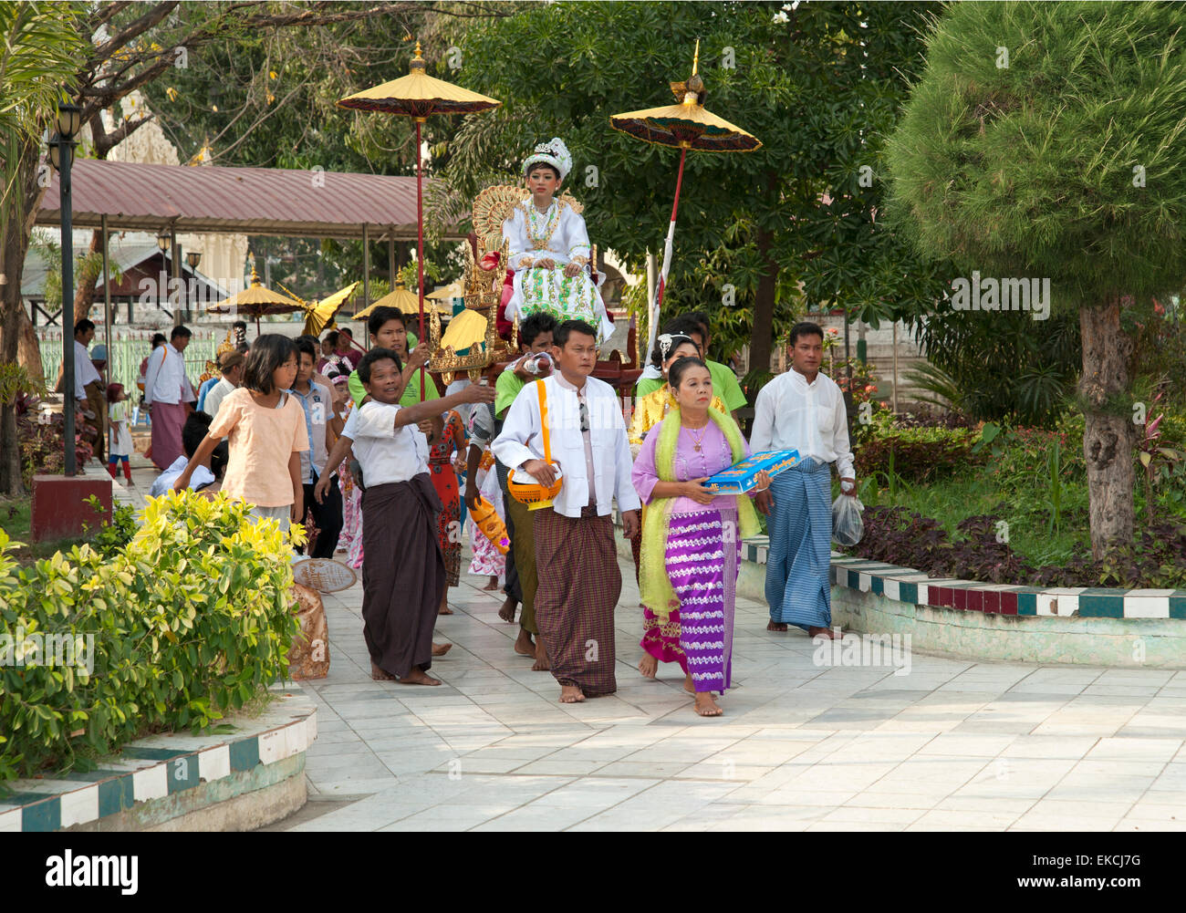 Children and their families parade in gaudy bejeweled costumes in their ...