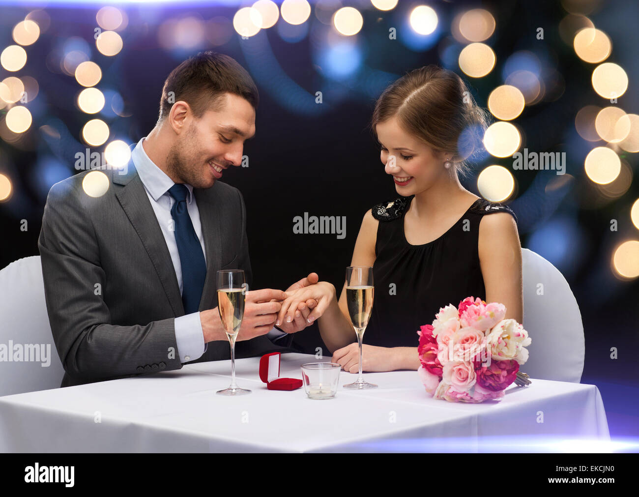 man proposing to his girlfriend at restaurant Stock Photo - Alamy
