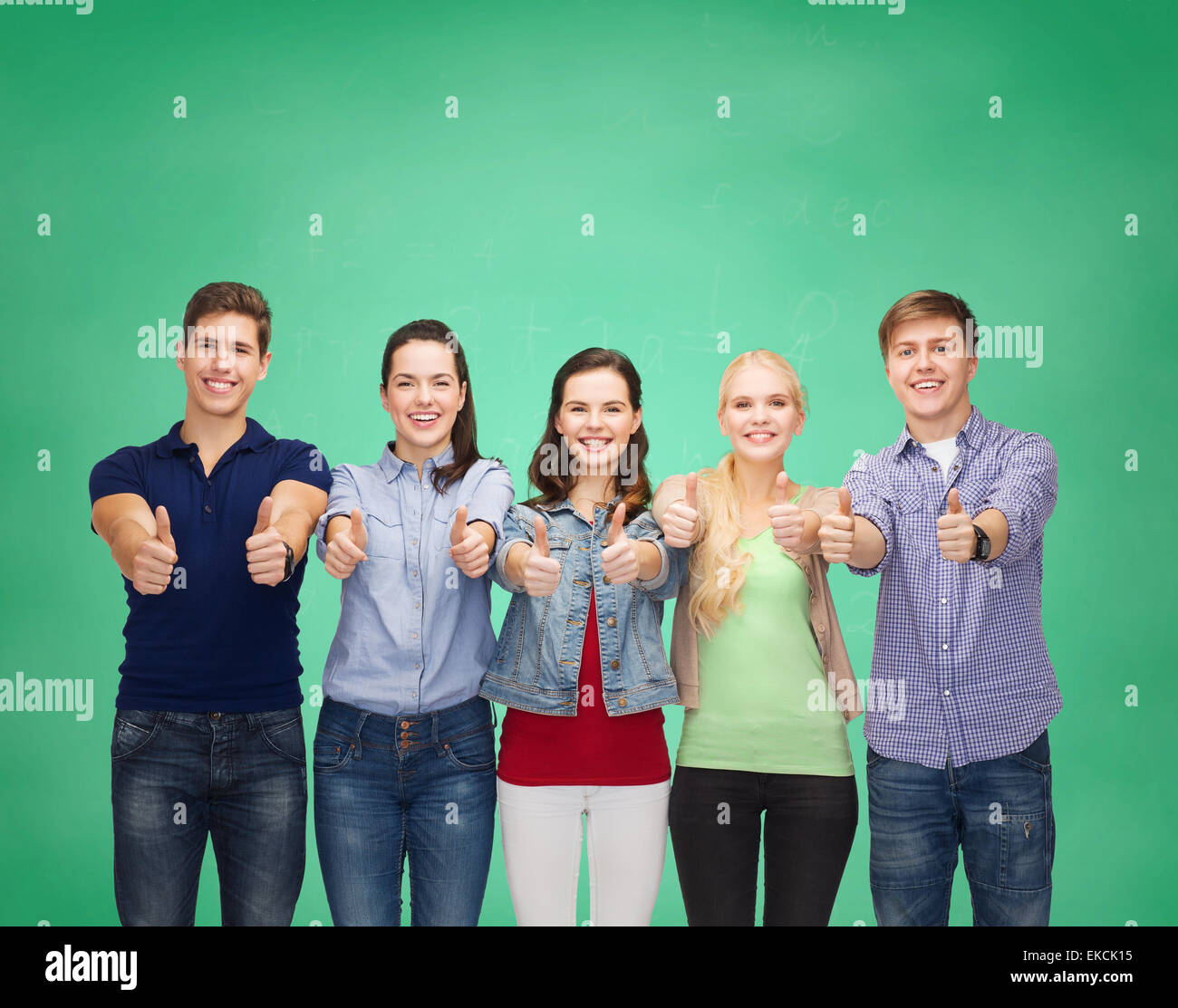 group of smiling students showing thumbs up Stock Photo - Alamy