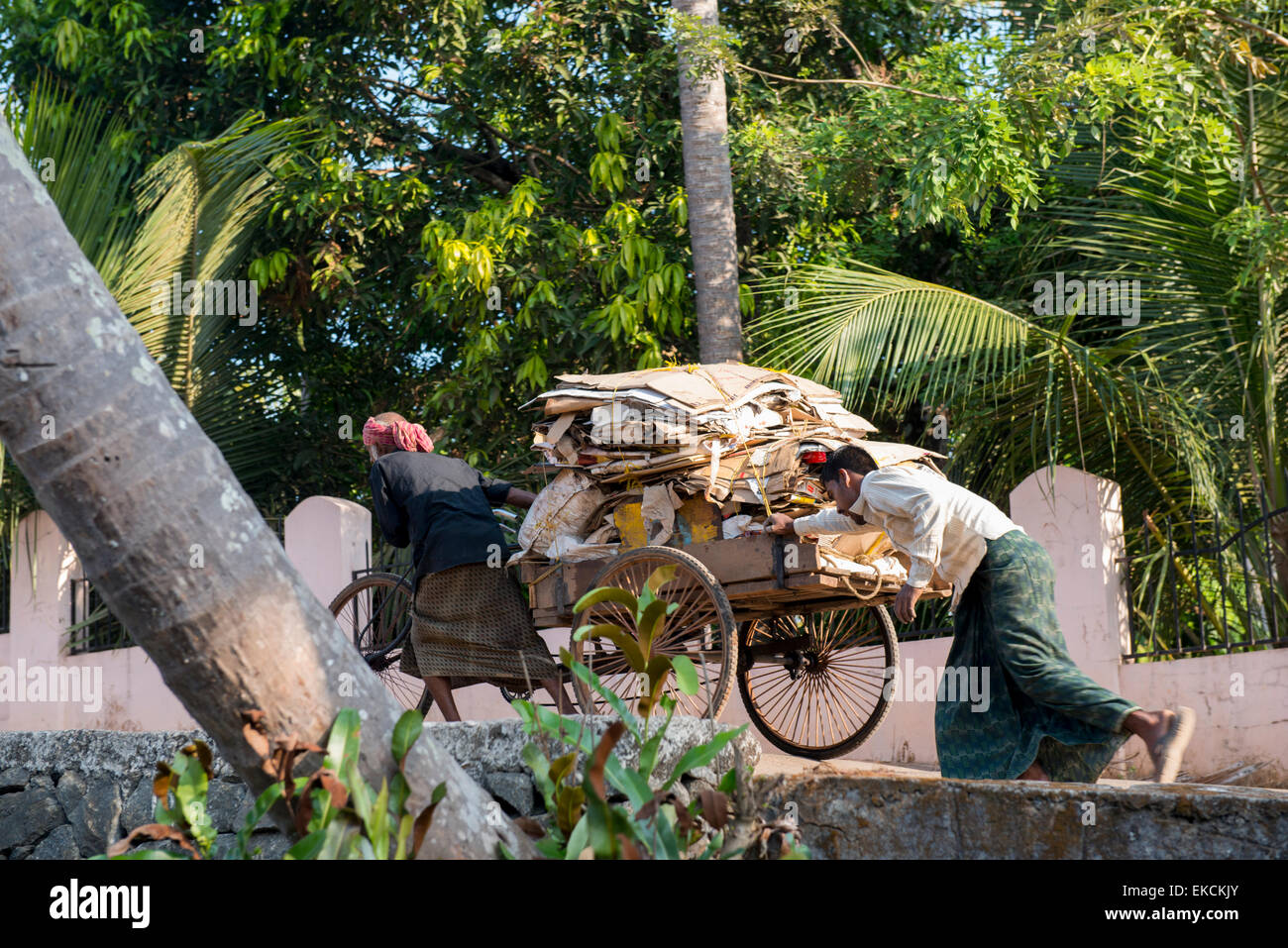 Pushing a heavy load hi-res stock photography and images - Alamy