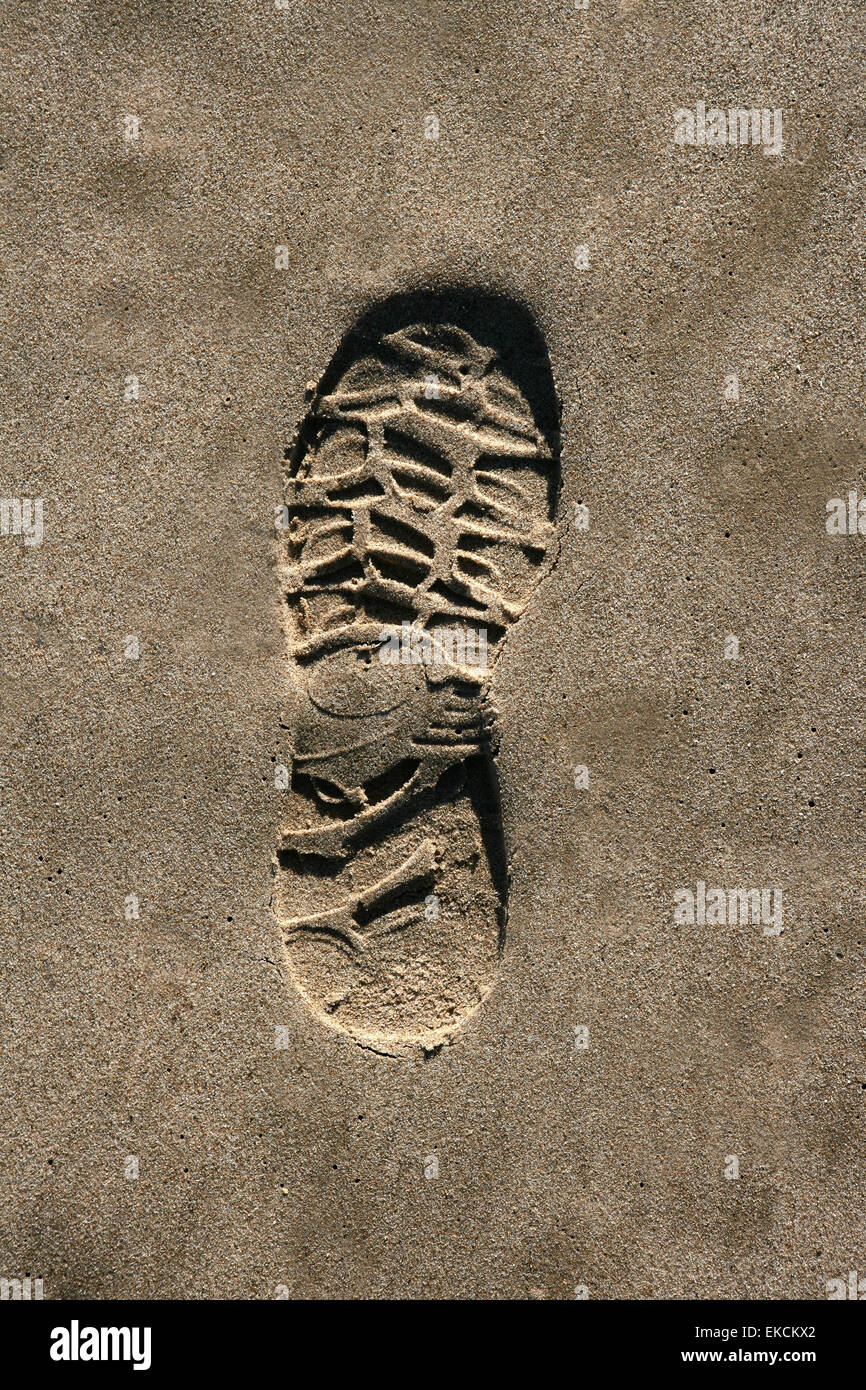 footprint shoe on beach brown sand texture print Stock Photo - Alamy