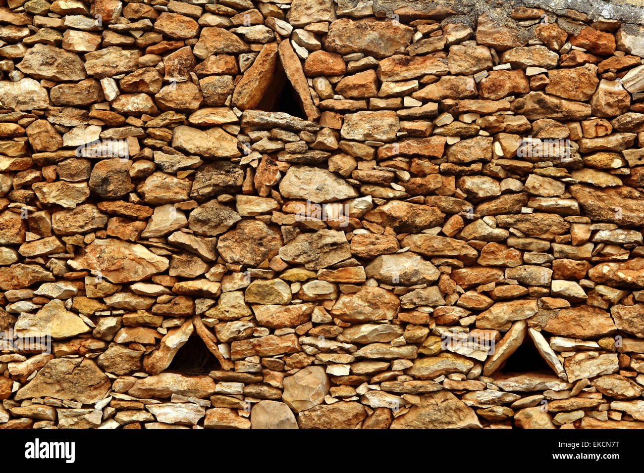 Masonry stone wall triangle windows hi-res stock photography and images ...
