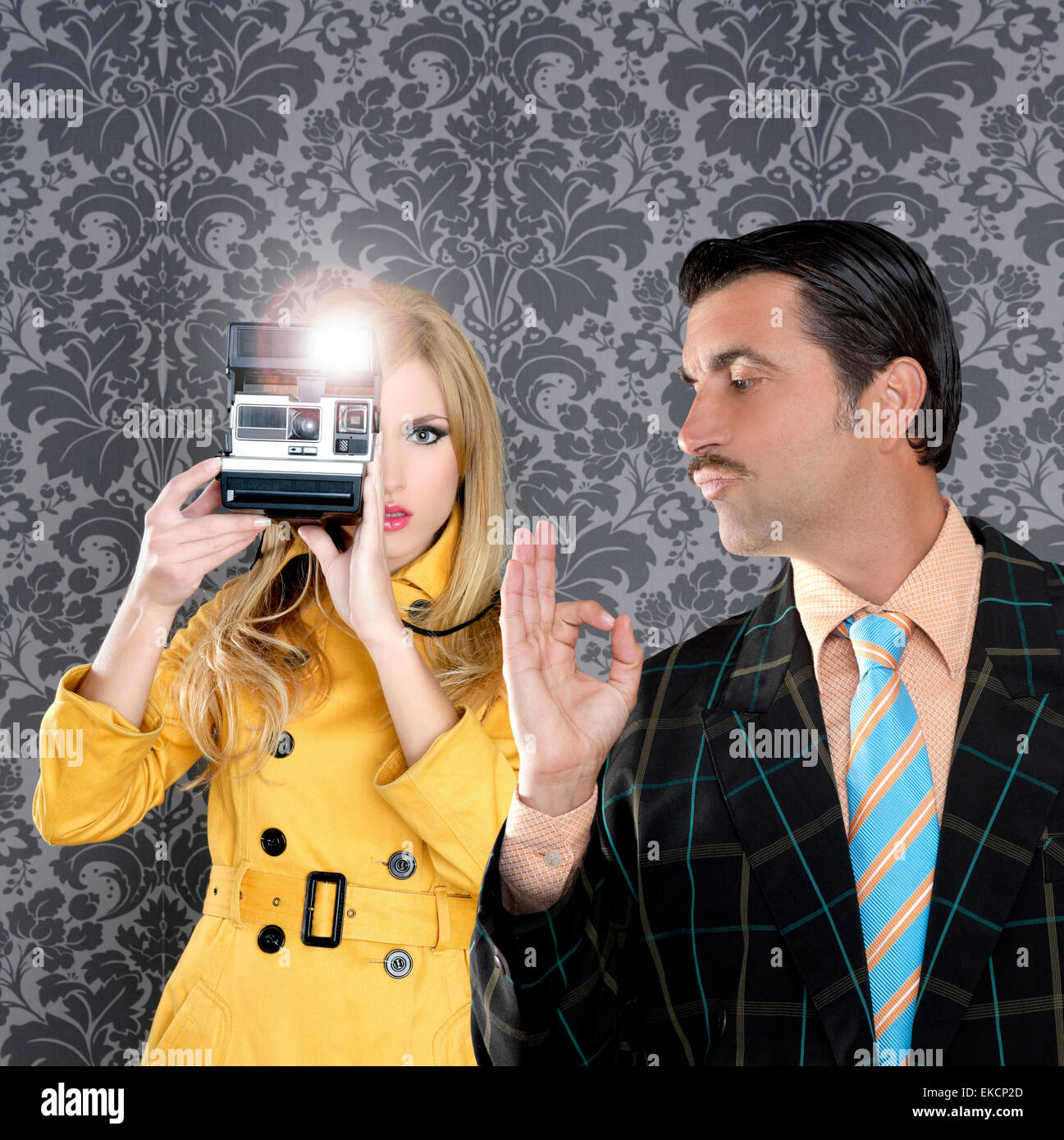 geek mustache man reporter fashion girl photo shoot Stock Photo - Alamy