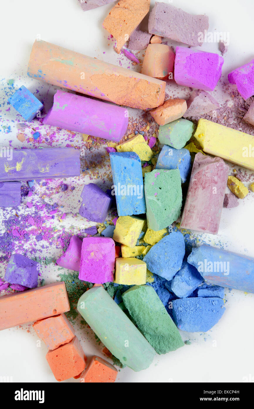 Colorful chalk broken colors mess over white Stock Photo - Alamy