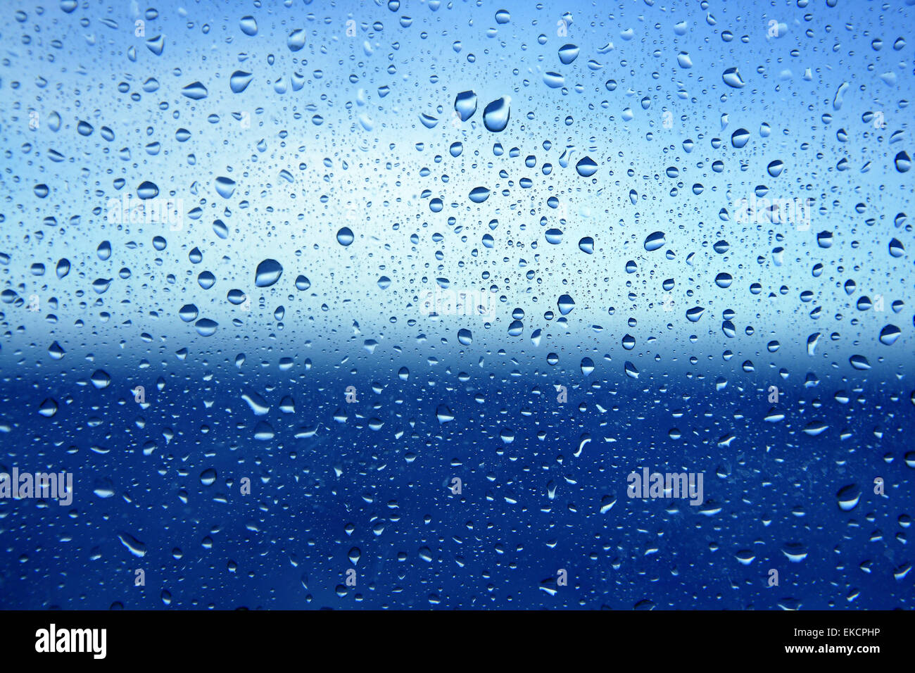 Abstract blue water dropsoin glass background Stock Photo - Alamy