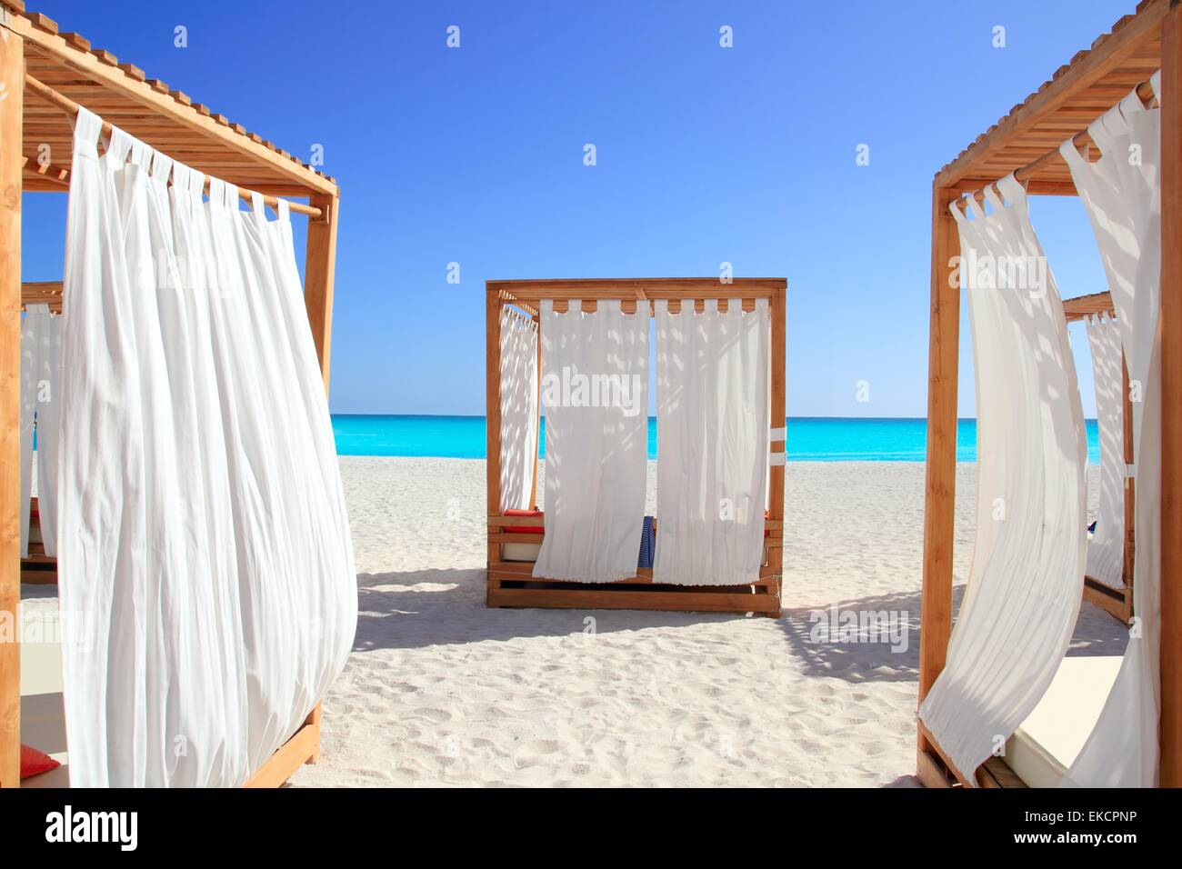 Caribbean gazebo beds in tropical beach sand Stock Photo - Alamy