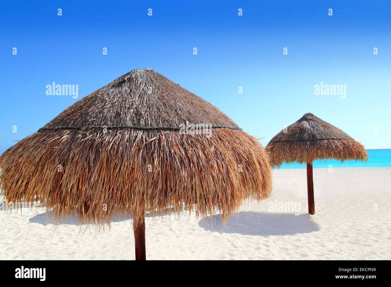 beach traditional sunroof hut caribbean umbrellas Stock Photo - Alamy