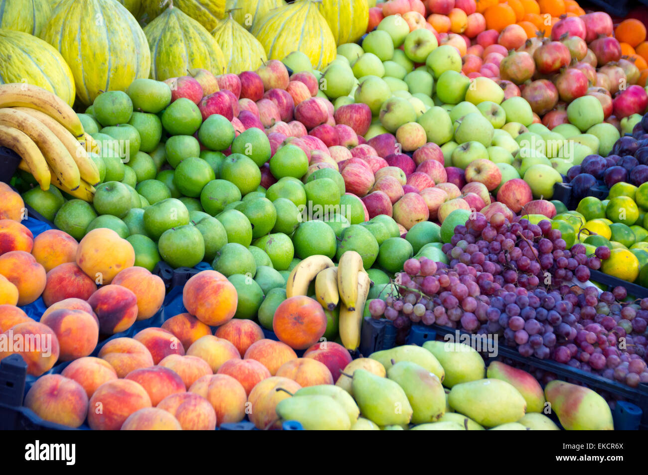 Variety of fresh organic fruits on the street stall Stock Photo - Alamy