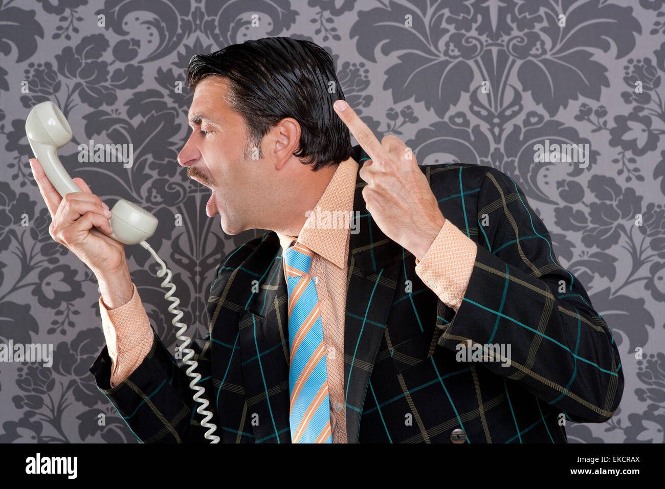 Angry nerd businessman retro telephone call shouting Stock Photo - Alamy