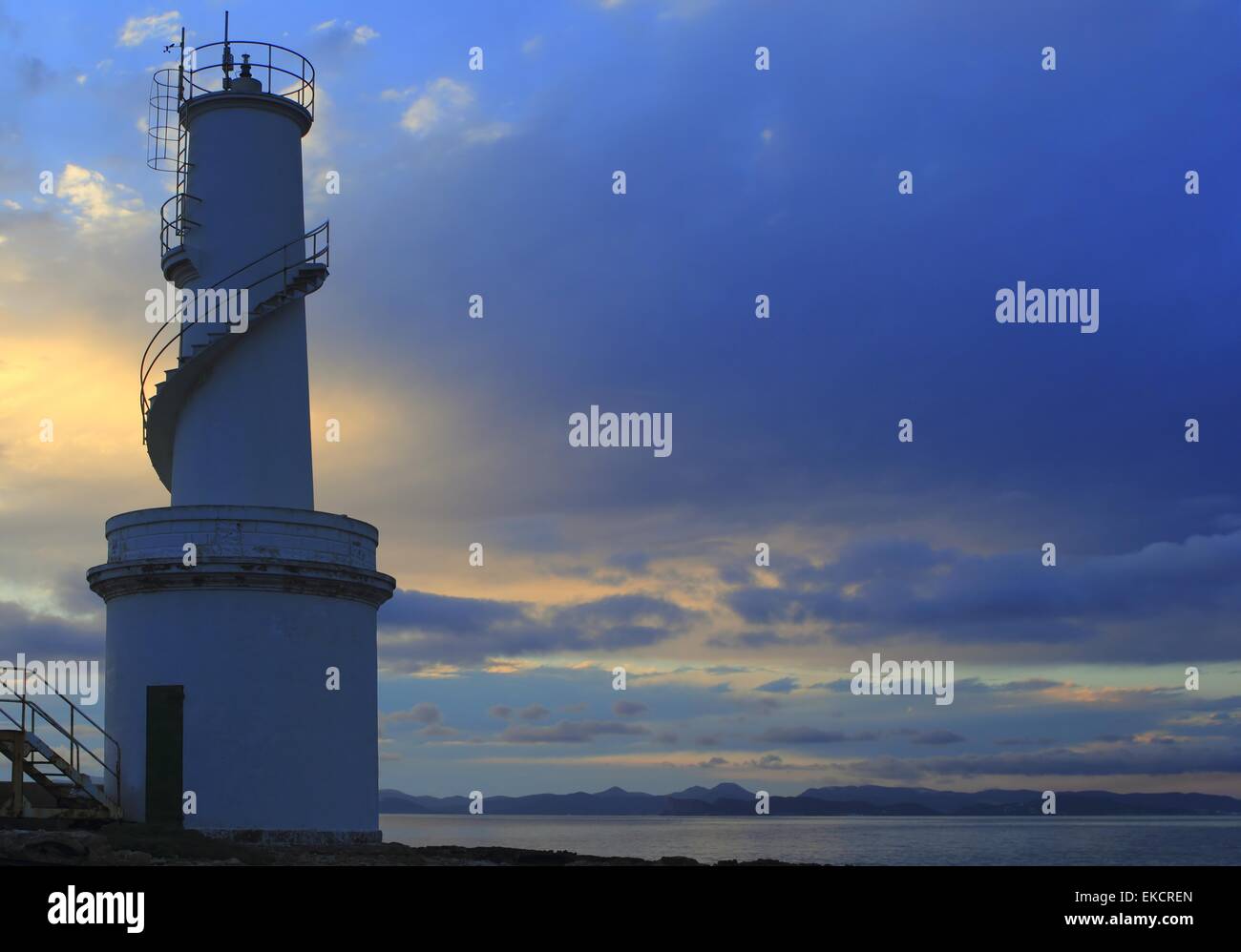 La Savina port lighthouse Formentera sunset Stock Photo - Alamy