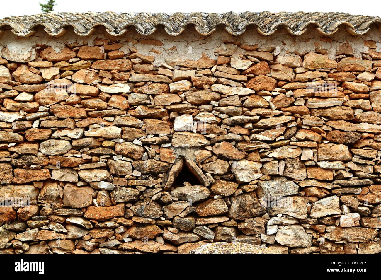 Masonry stone wall triangle windows hi-res stock photography and images ...