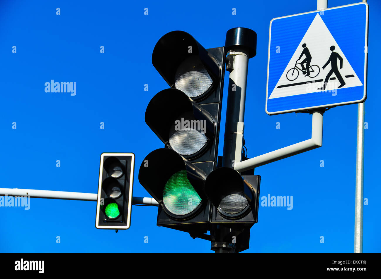 Traffic lights over blue sky Stock Photo - Alamy