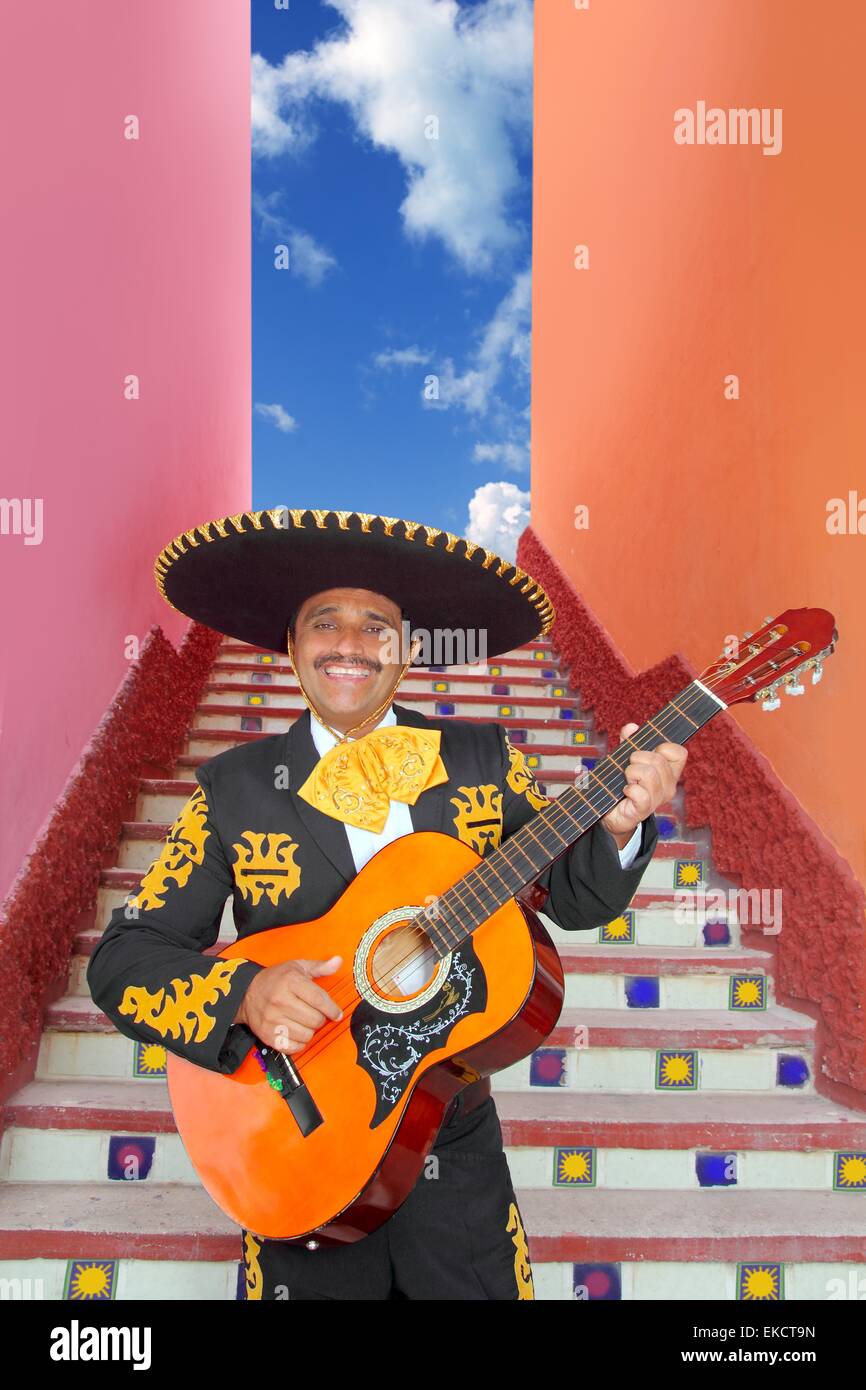 Charro Mariachi playing guitar in Mexico stairway Stock Photo - Alamy
